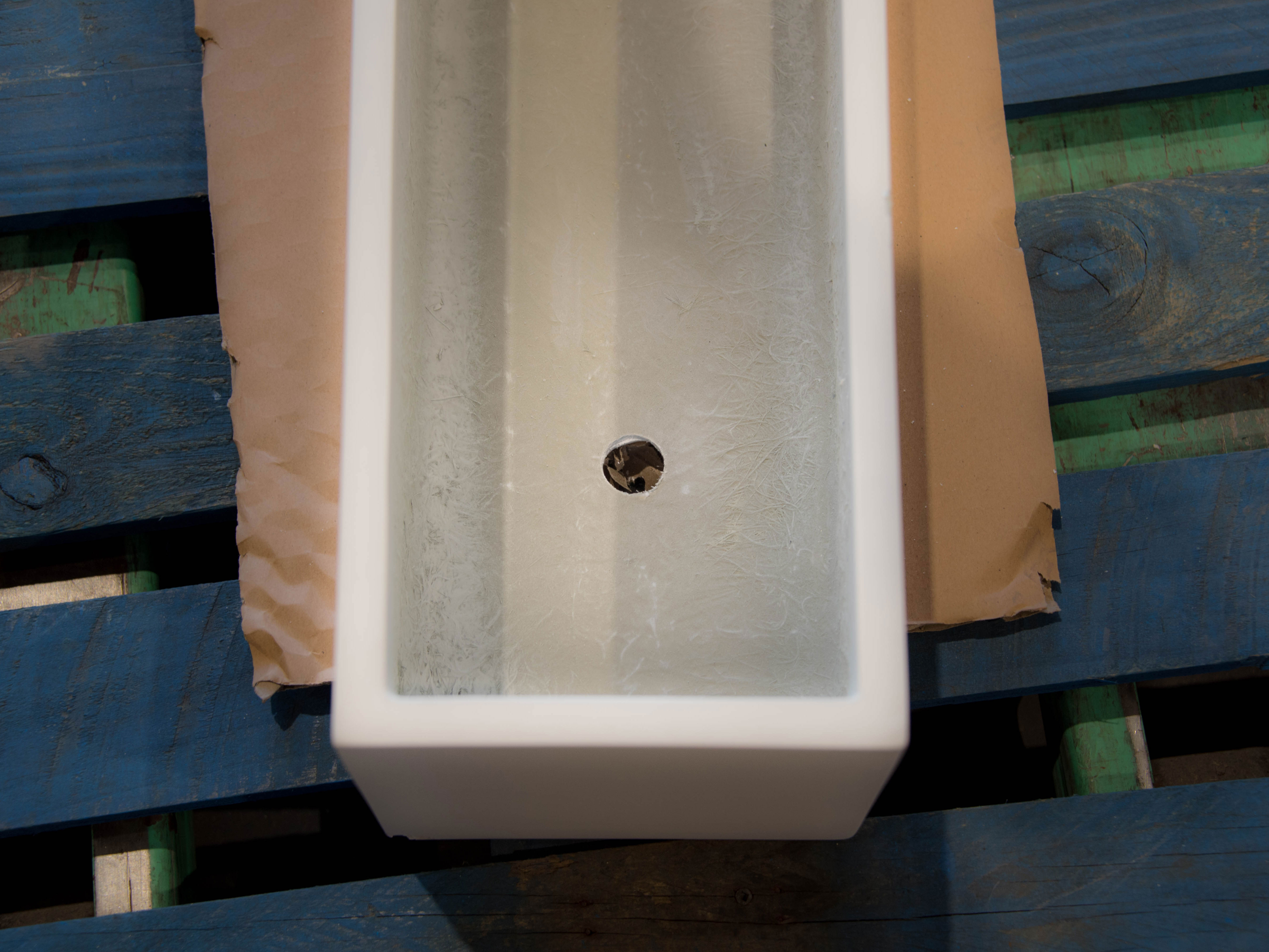 drainage-hole-in-fiberglass-plant-container | NewPro Blog